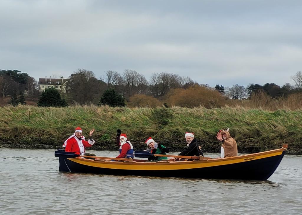 The Annual Santa row – Woodbridge Coastal Rowing Club